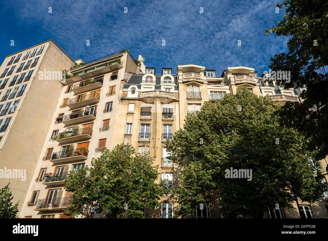 Parisian architecture high rise complex with apartments and balconies ...