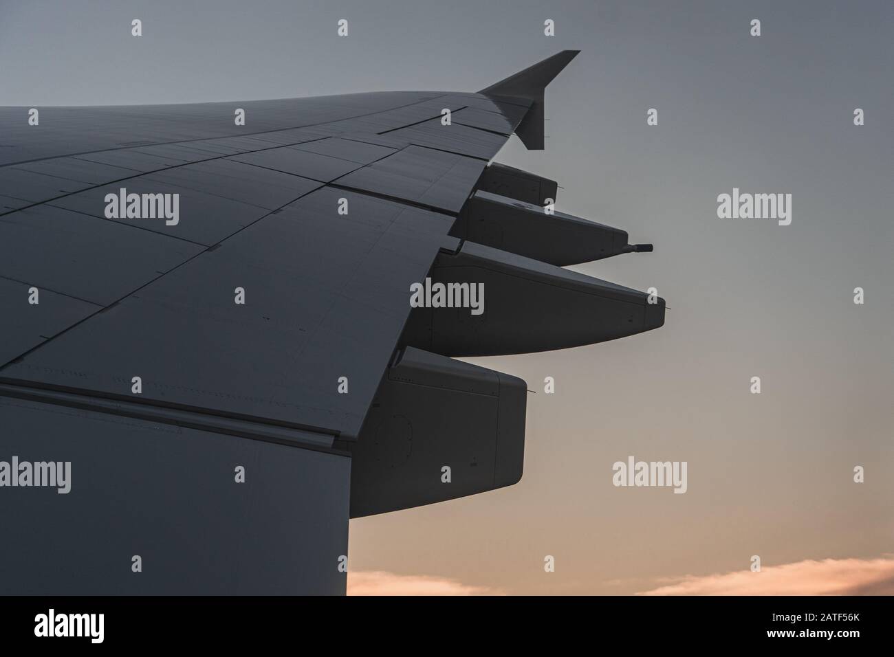 airplane wing through the airplane window Stock Photo - Alamy