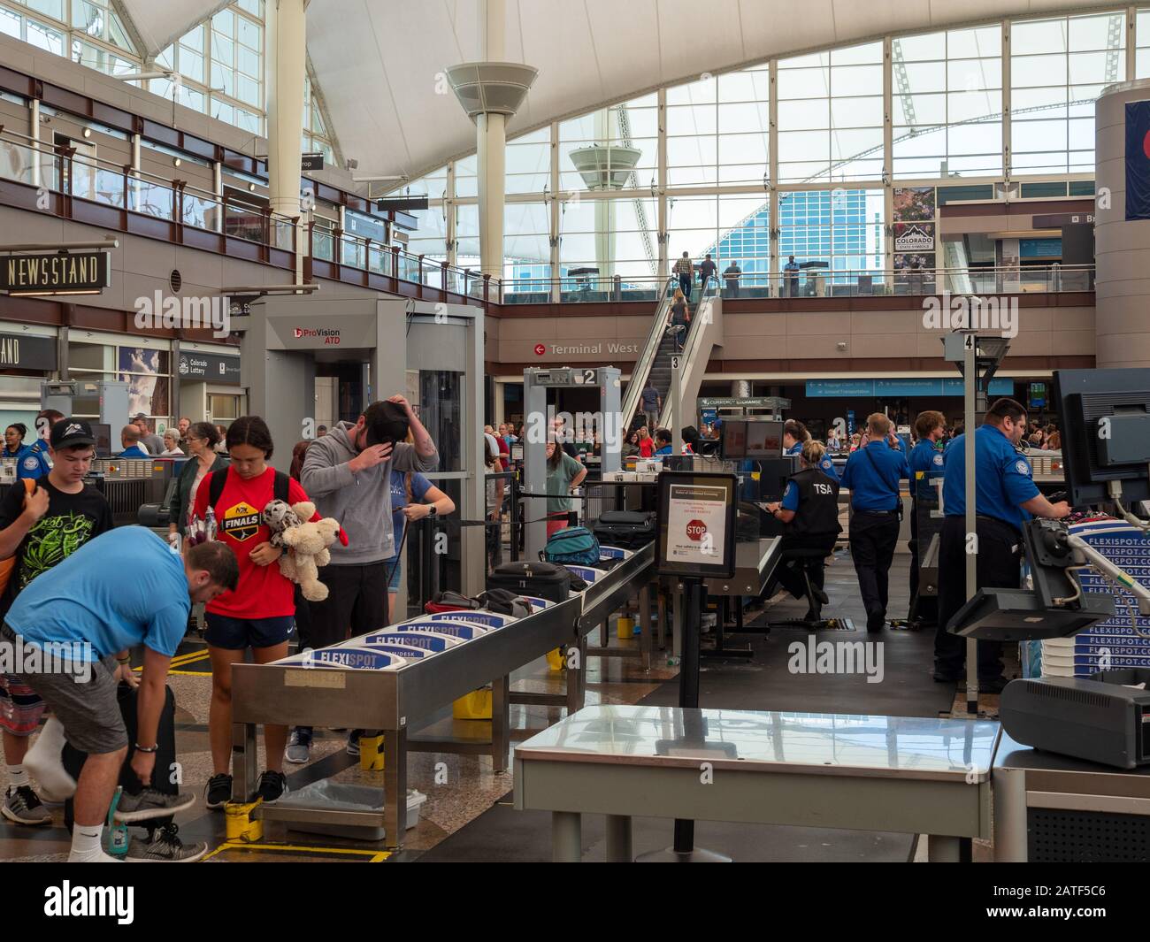 Transportation Security Administration TSA agents manage a security ...