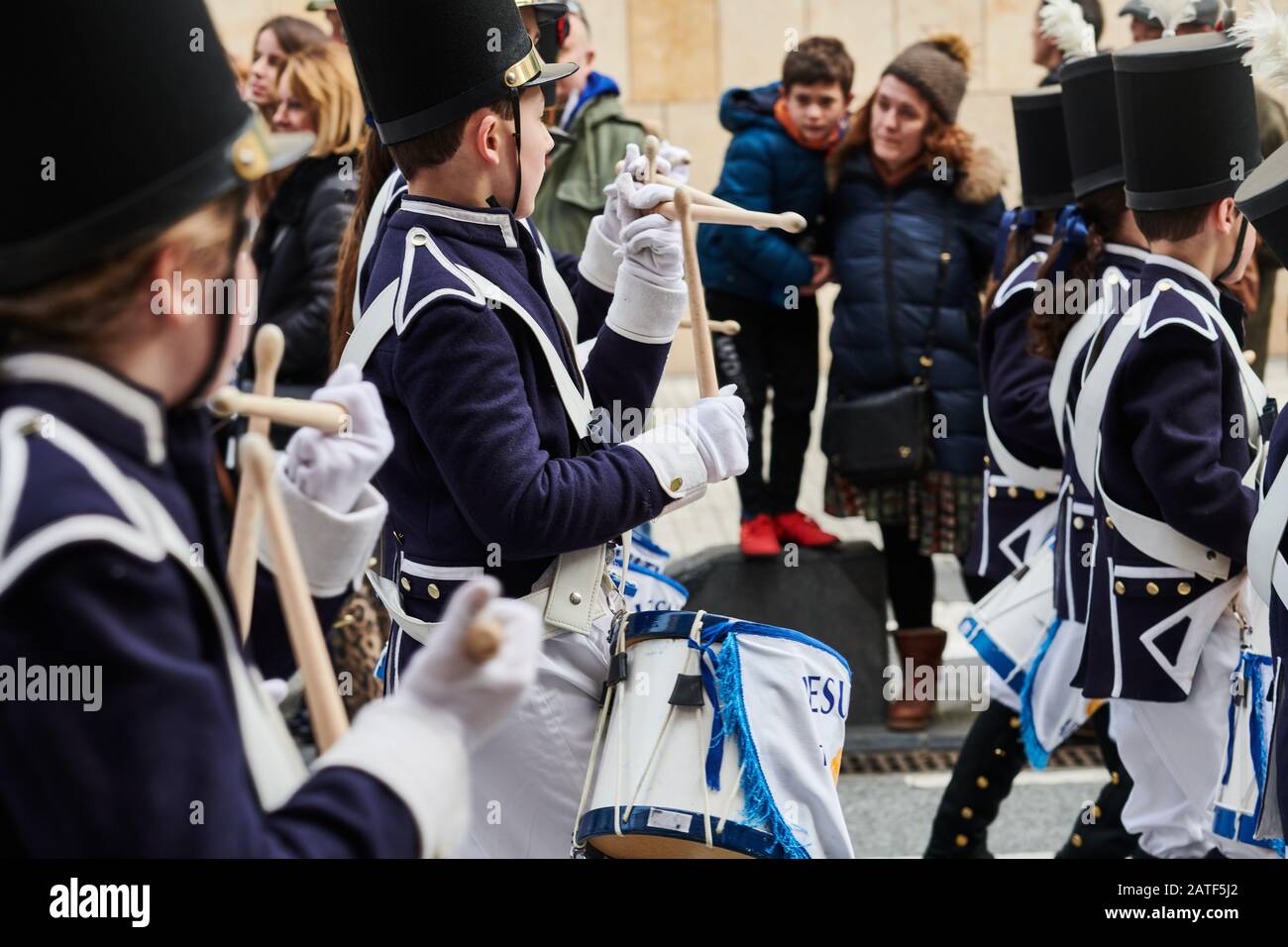 Traditional Tamborrada parade of children dressed up as soldiers and ...