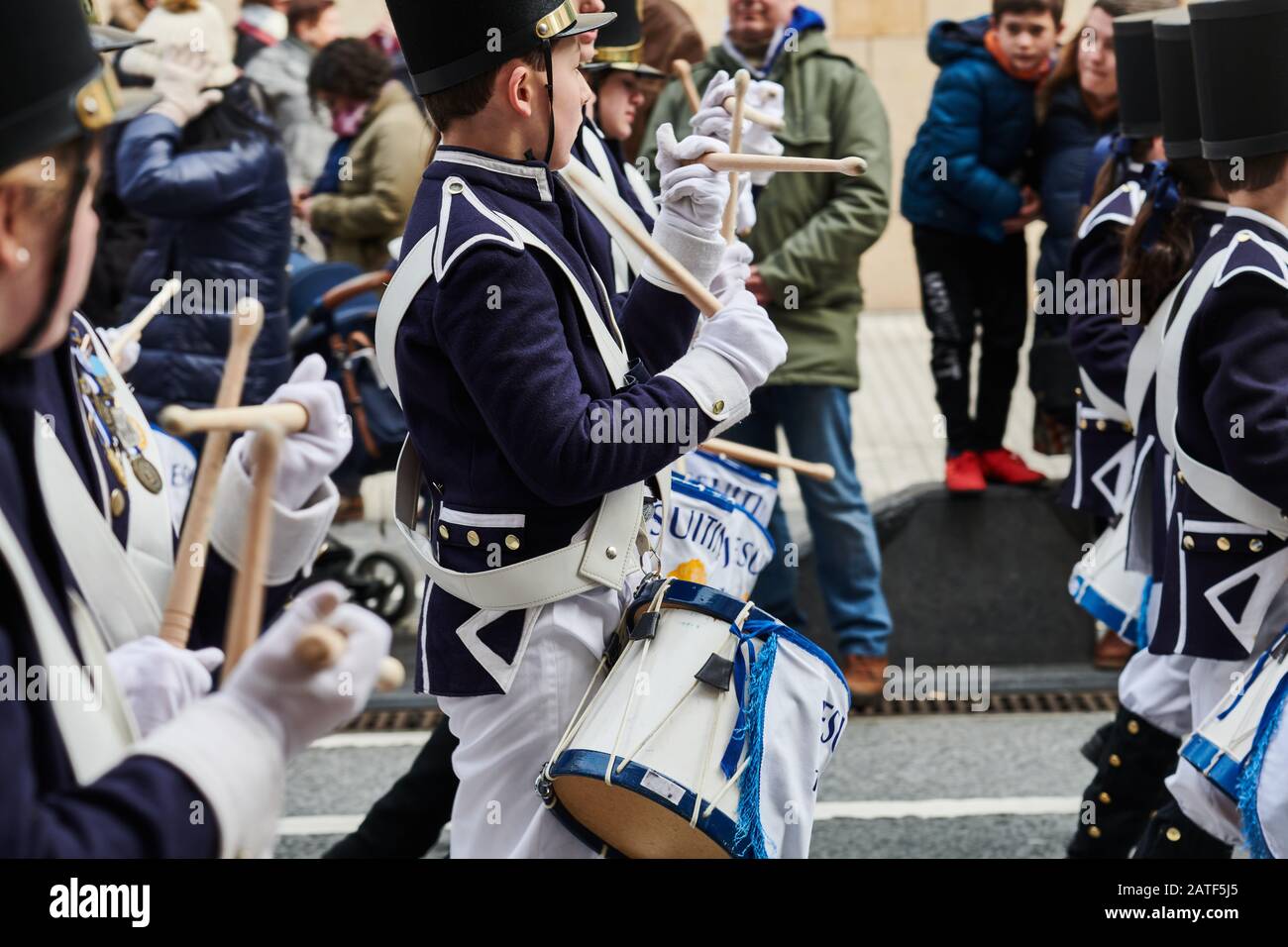 Traditional Tamborrada parade of children dressed up as soldiers and ...
