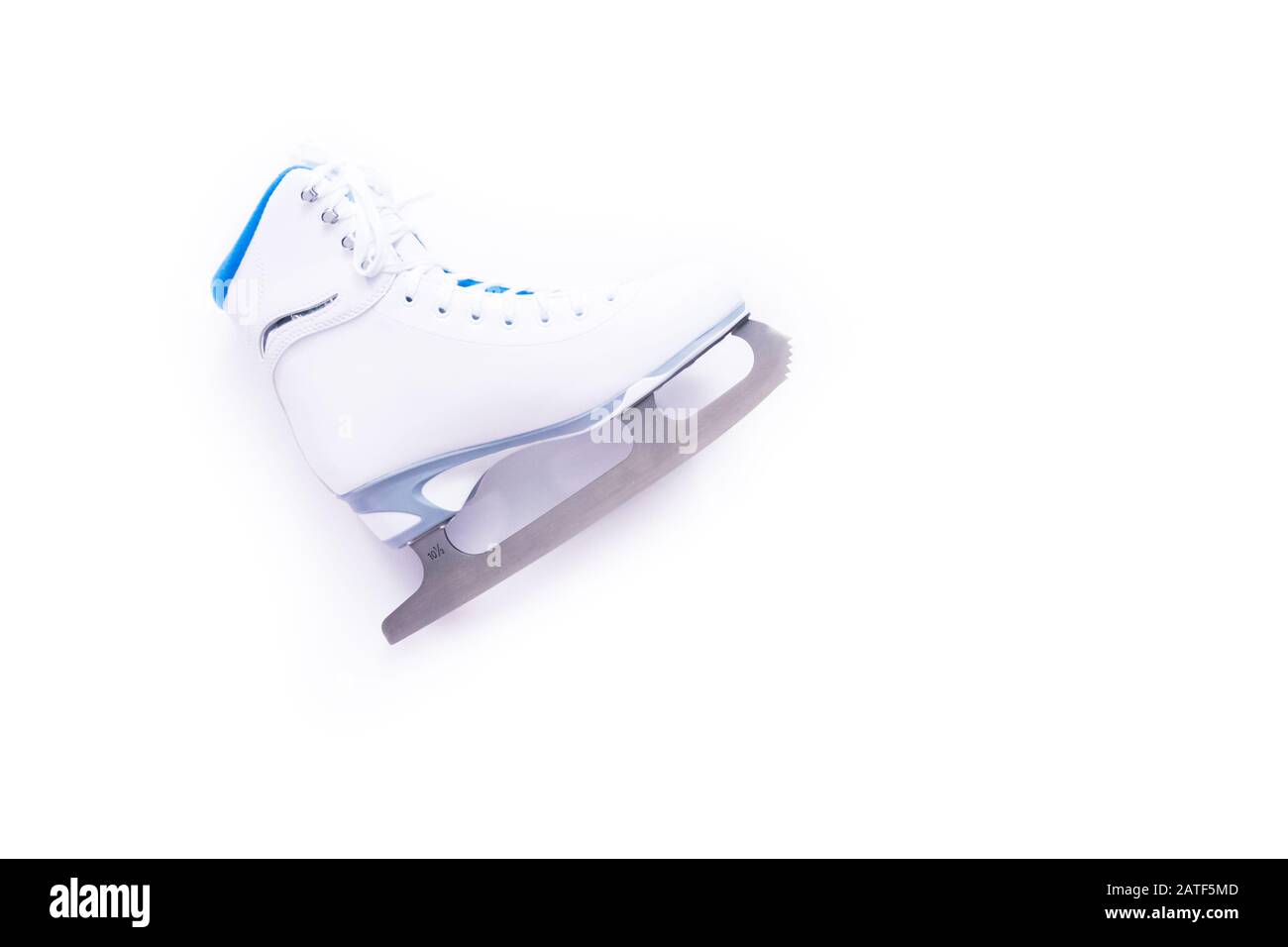 Flat lay. New white figure skates on a white background Stock Photo - Alamy