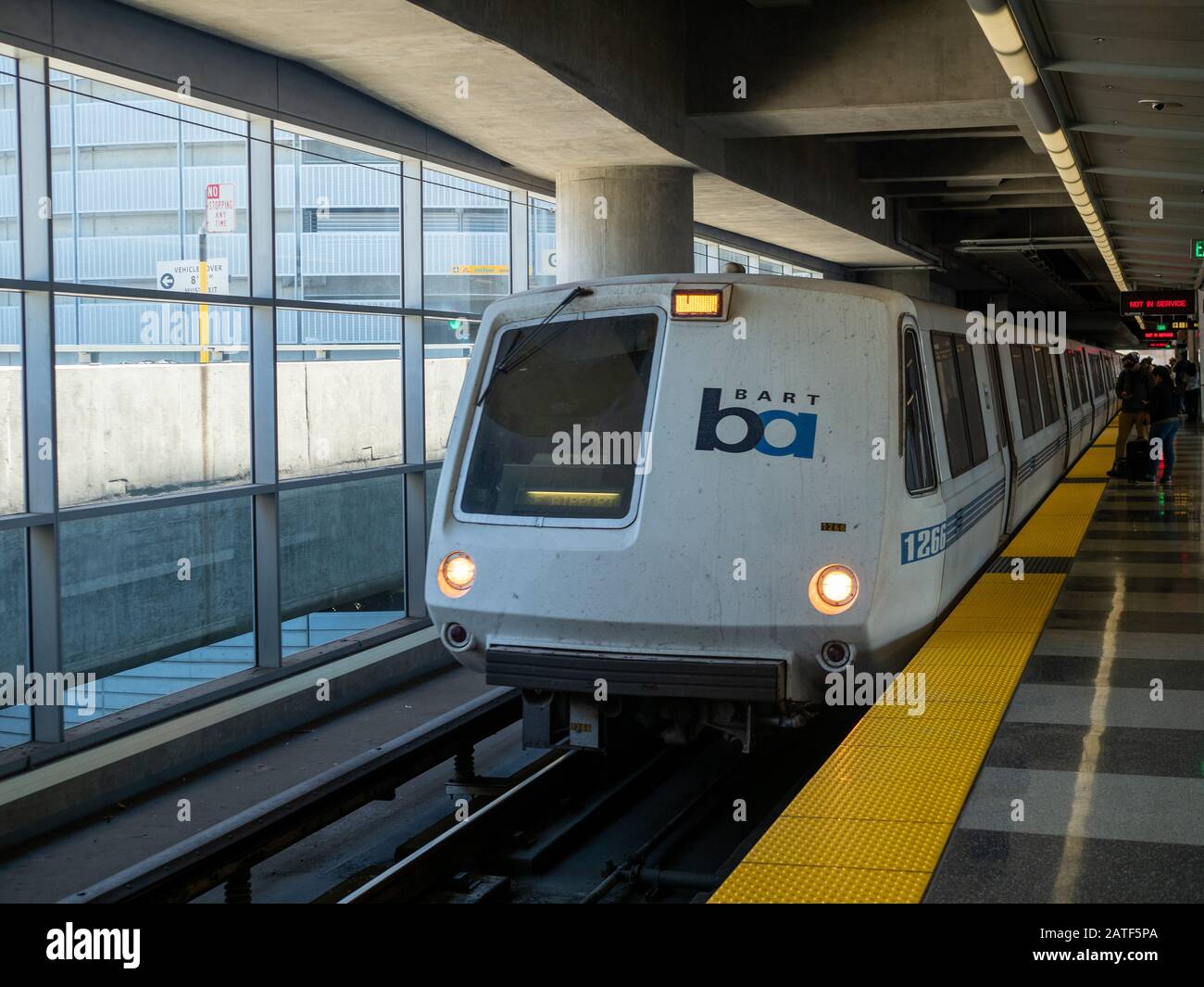 BART bay area rapid transit train pulling in at SFO airport stop Stock ...