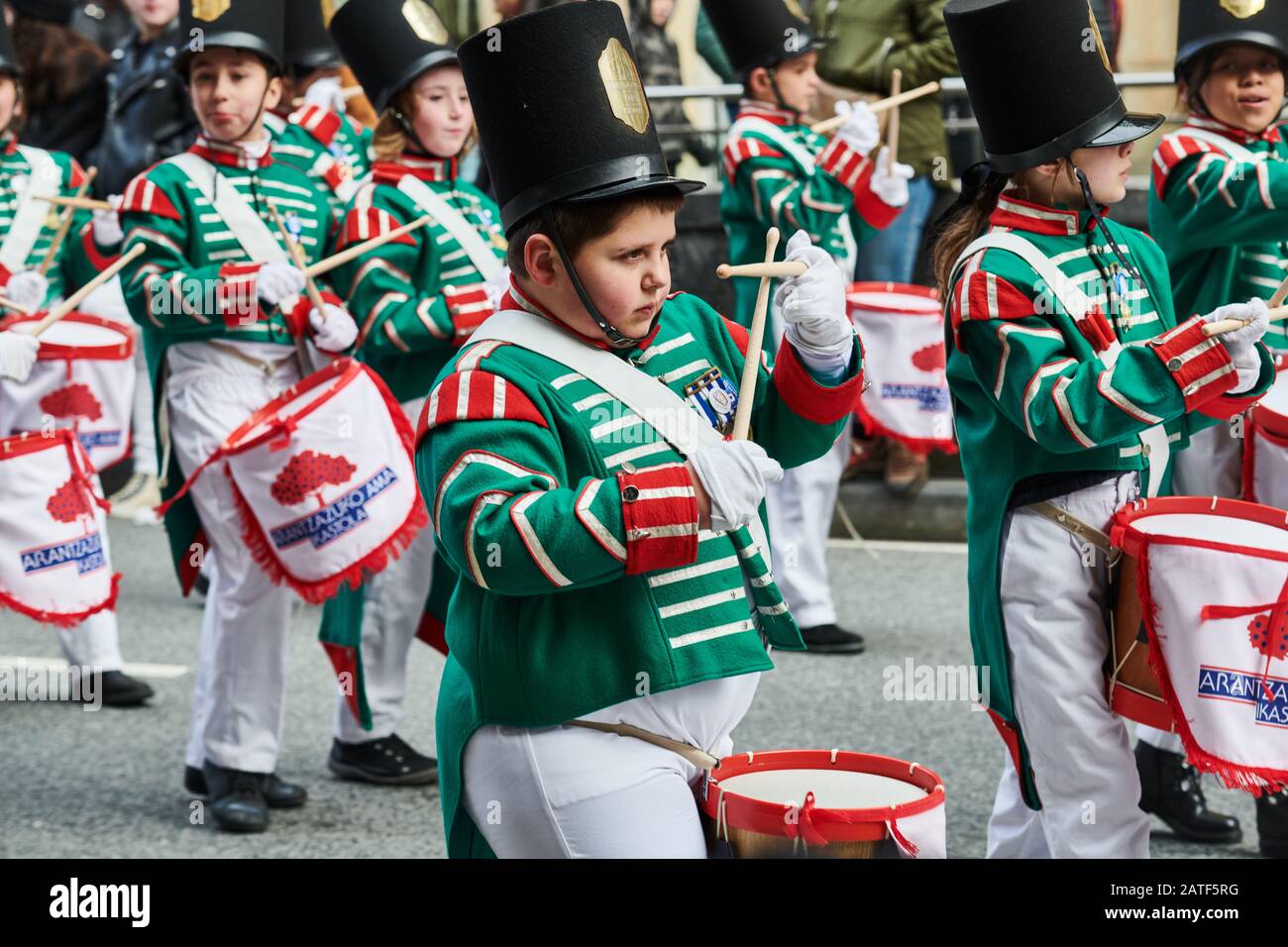 Traditional Tamborrada parade of children dressed up as soldiers and ...