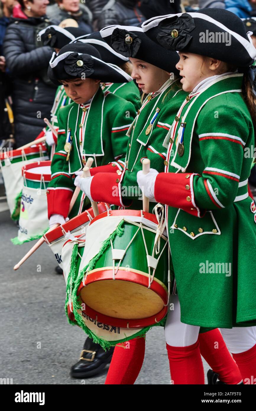 Traditional Tamborrada parade of children dressed up as soldiers and ...