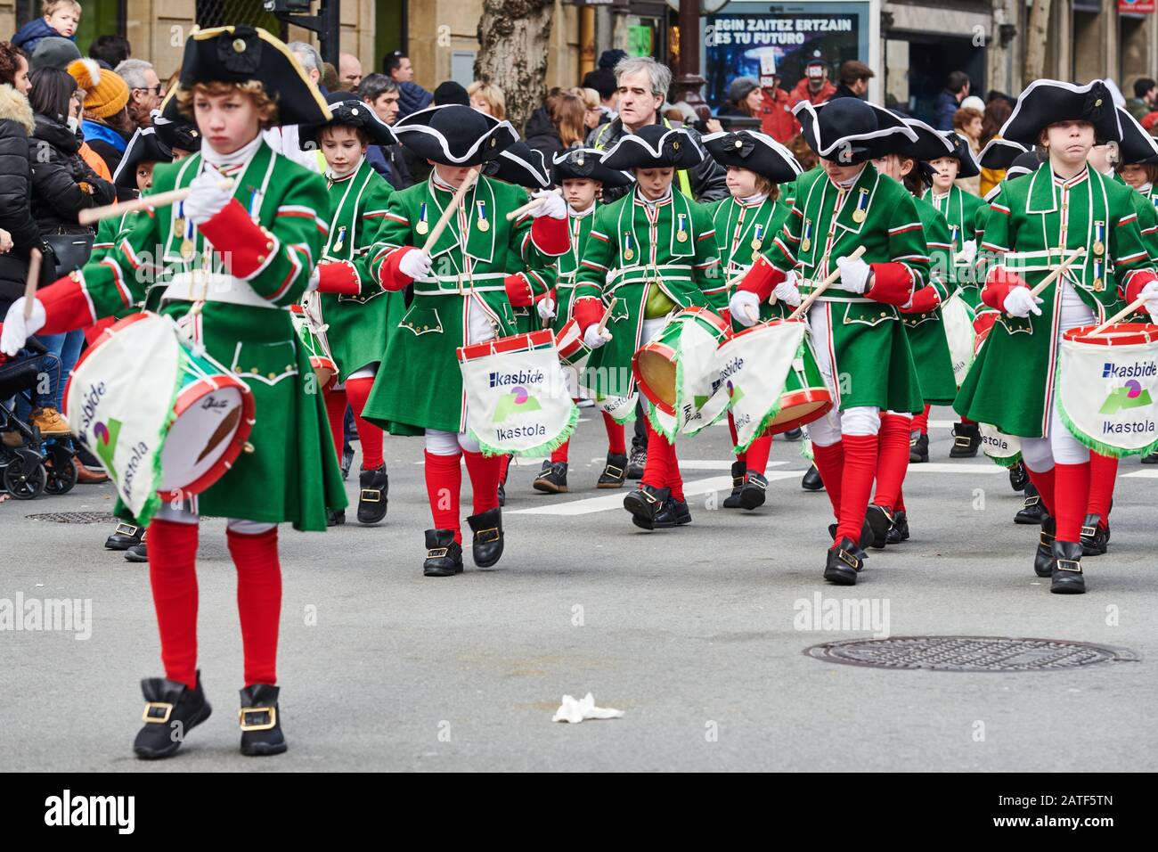 Traditional Tamborrada parade of children dressed up as soldiers and ...
