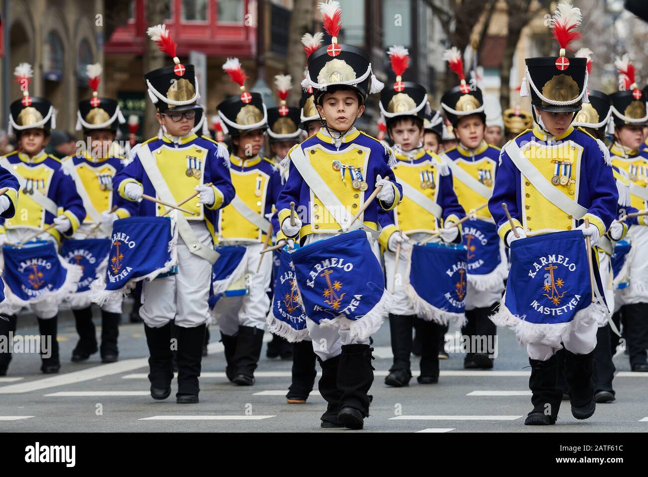 Traditional Tamborrada parade of children dressed up as soldiers and ...