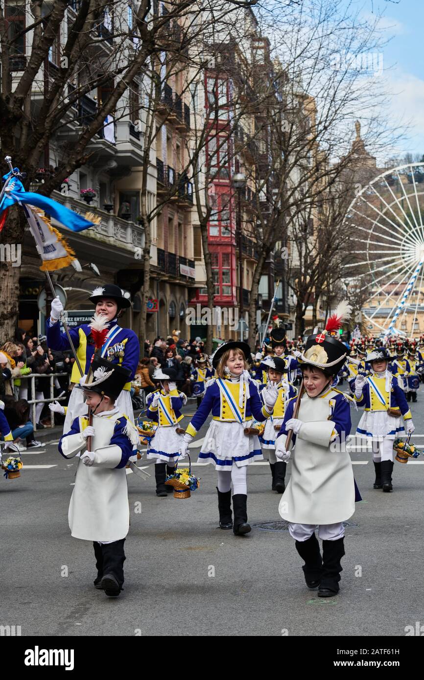 Traditional Tamborrada parade of children dressed up as soldiers and ...