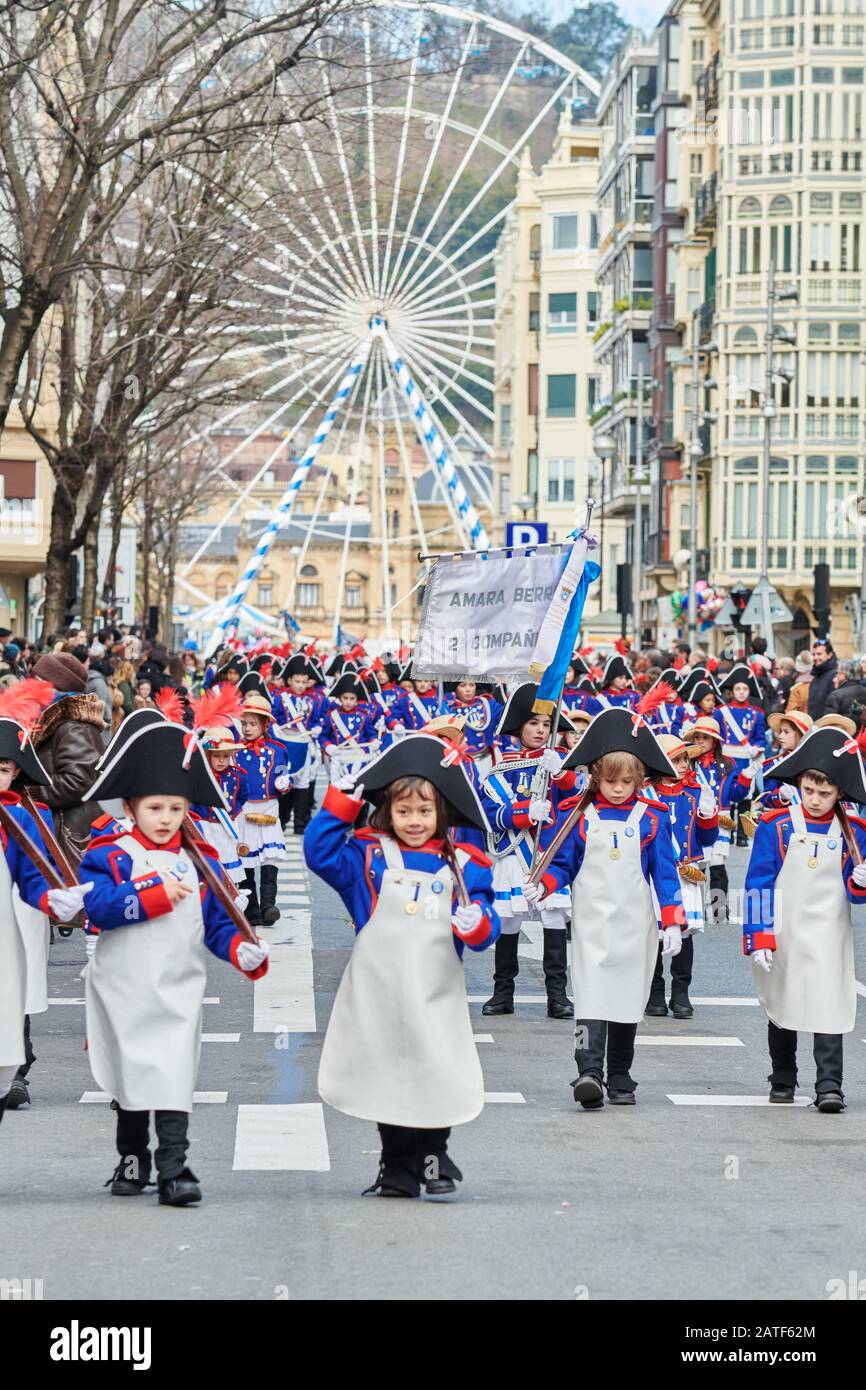 Traditional Tamborrada parade of children dressed up as soldiers and ...
