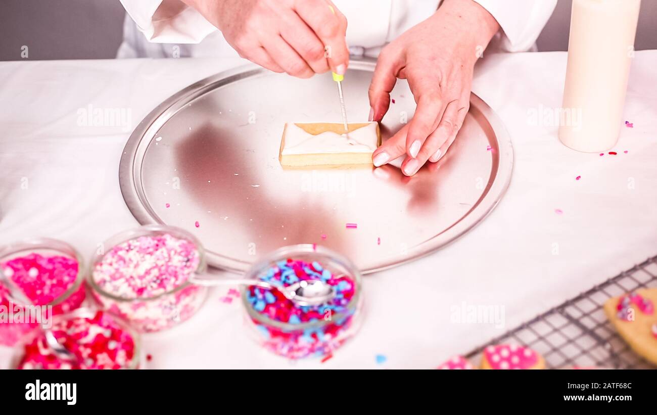 Step by step. Decorating sugar cookies with royal icing and sprinkles ...