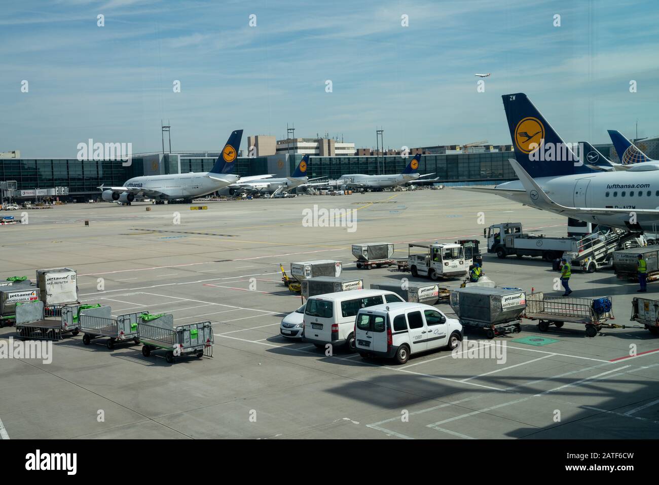 Various Lufthansa aircraft on runway terminal at Frankfurt Airport ...