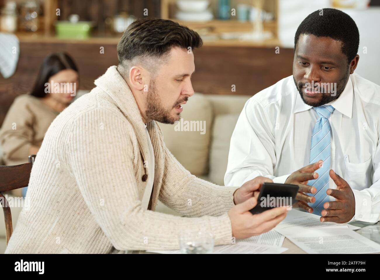 Real estate agent client discussing hi-res stock photography and images ...