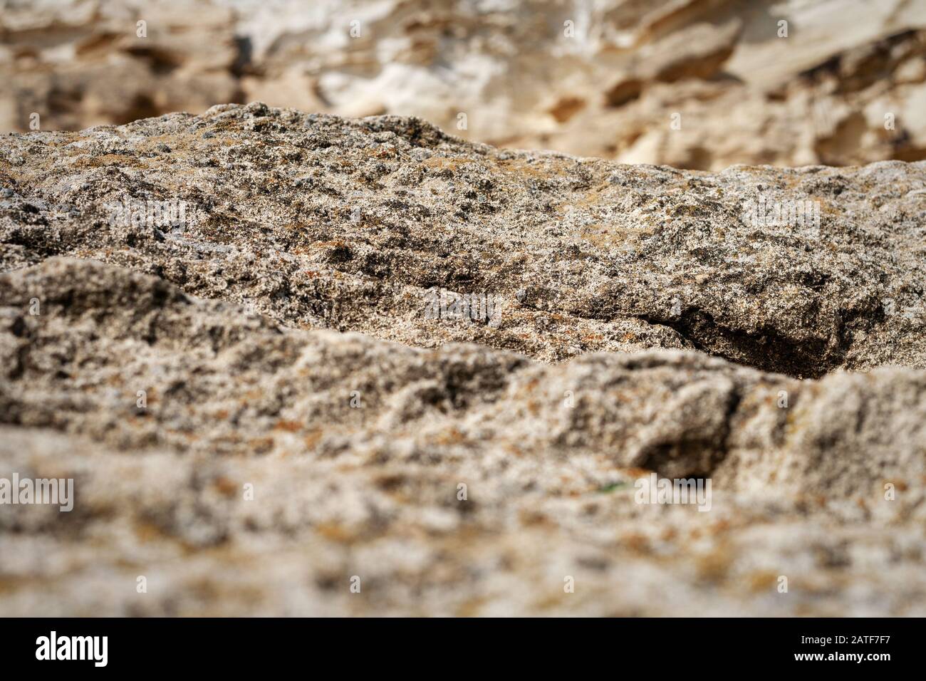 Surface sandy rock. Rocky shore of the Caspian Sea Stock Photo - Alamy