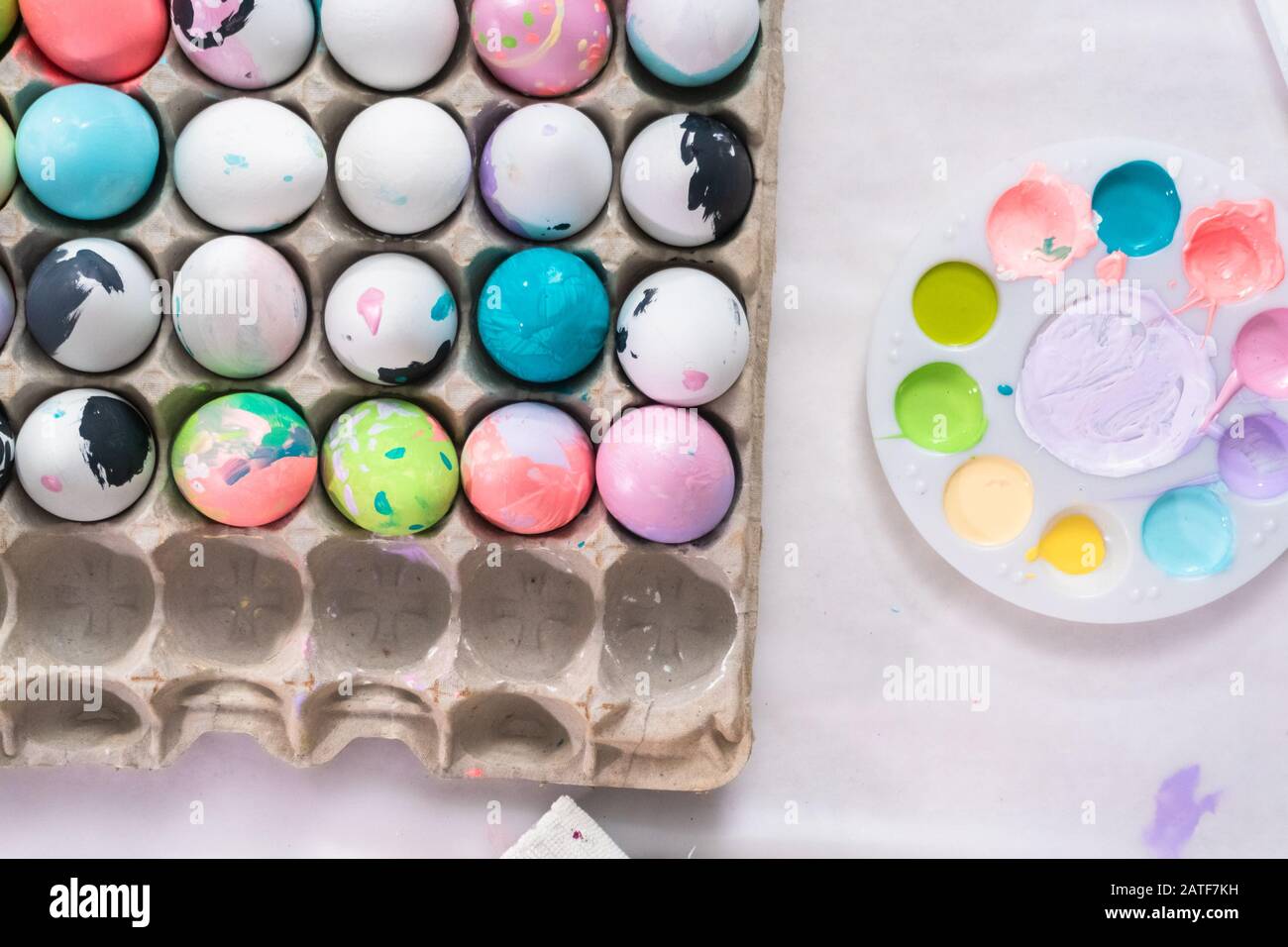 Flat lay. Painting craft Easter eggs with acrilic paint Stock Photo - Alamy