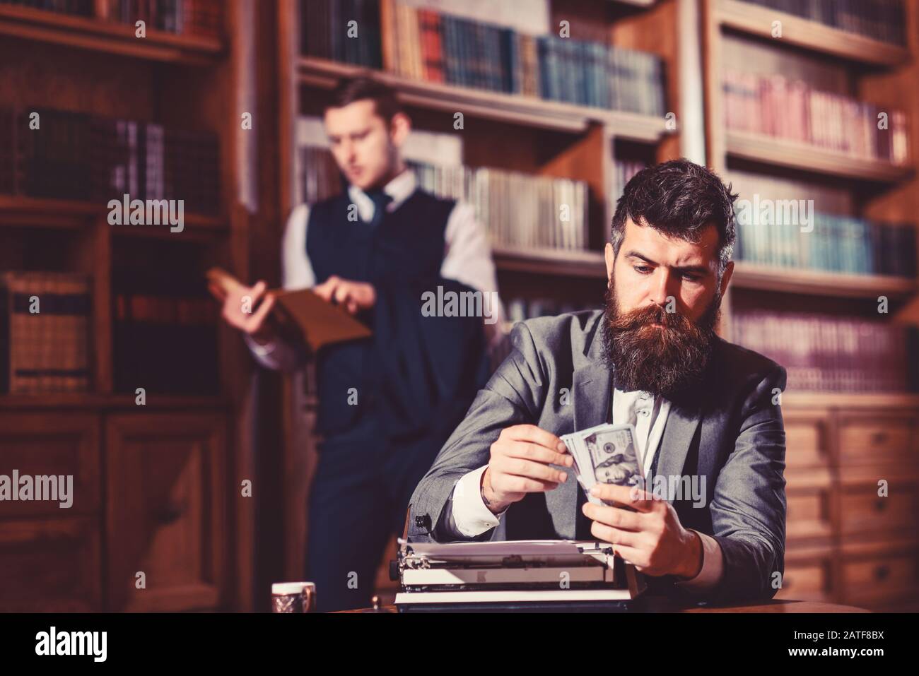 Writing and fees concept. Writer or author with strict face with ...