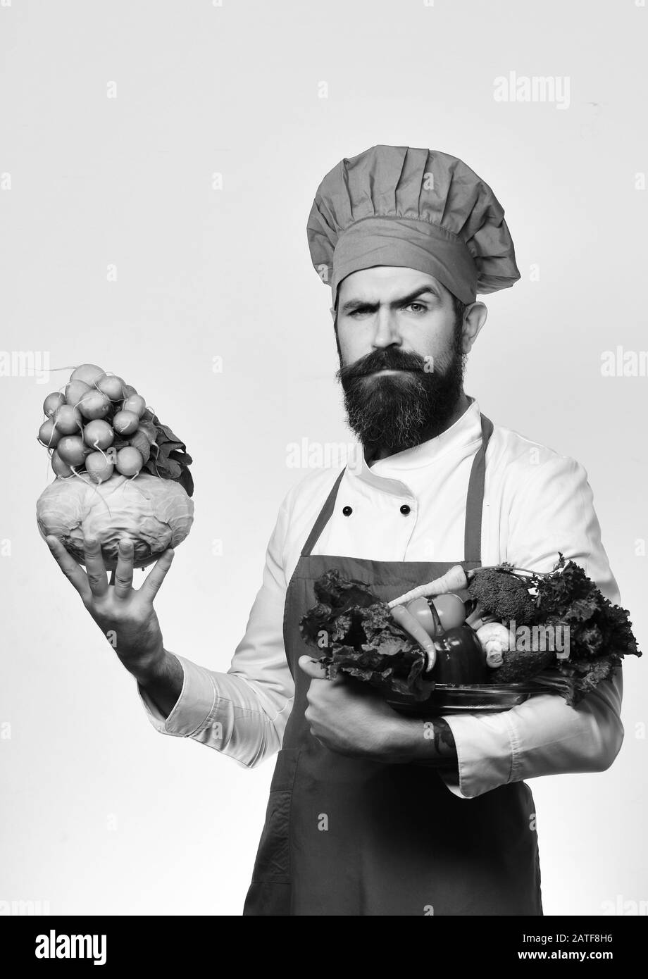 Man with beard isolated on white background. Cook with serious face in ...