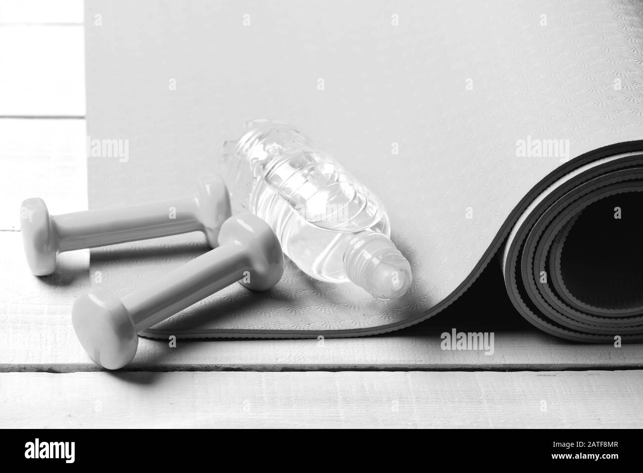 Water bottle dumbbells yoga Black and White Stock Photos & Images - Alamy