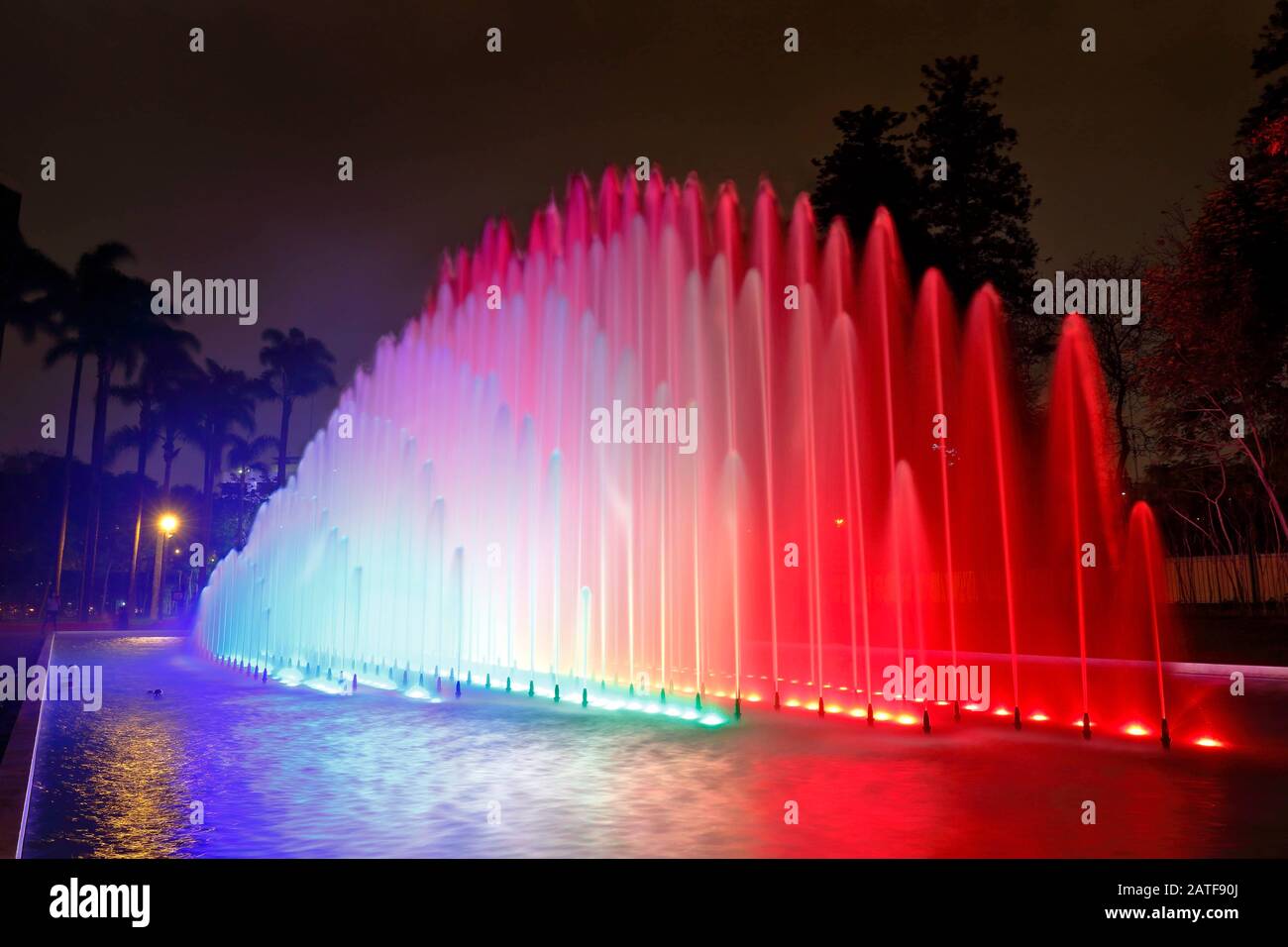 Beautiful view of a colorful water fountain, inside the magical water ...