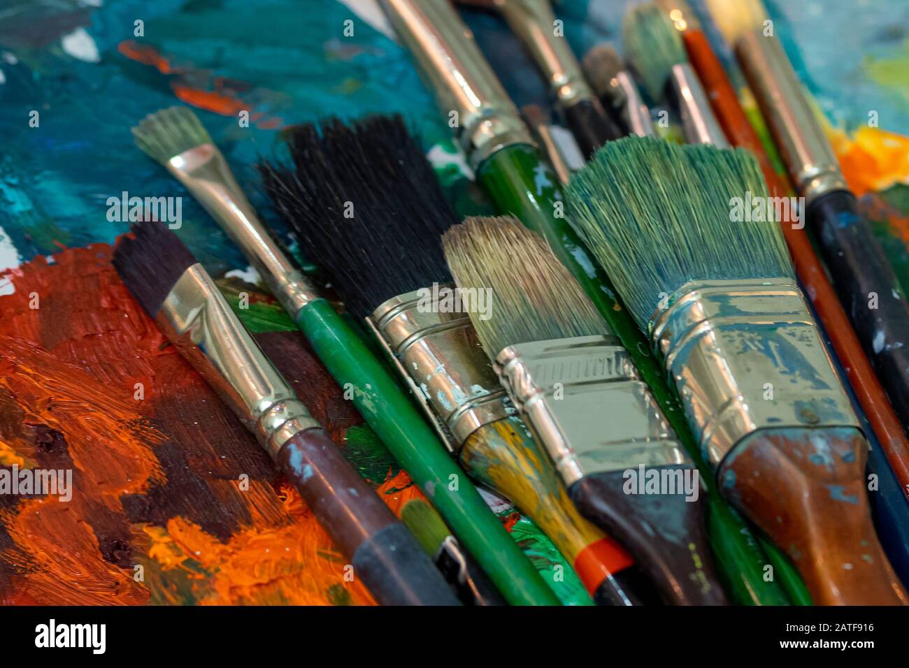 Colorful paint brushes. Art concept. Painting process Stock Photo - Alamy