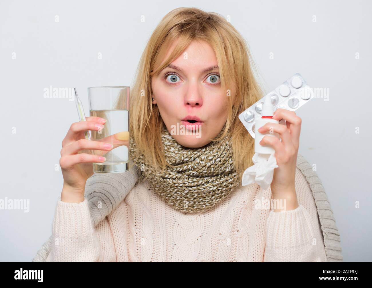 Take pills relieve fever. Drink plenty of fluids. Girl take medicine to ...