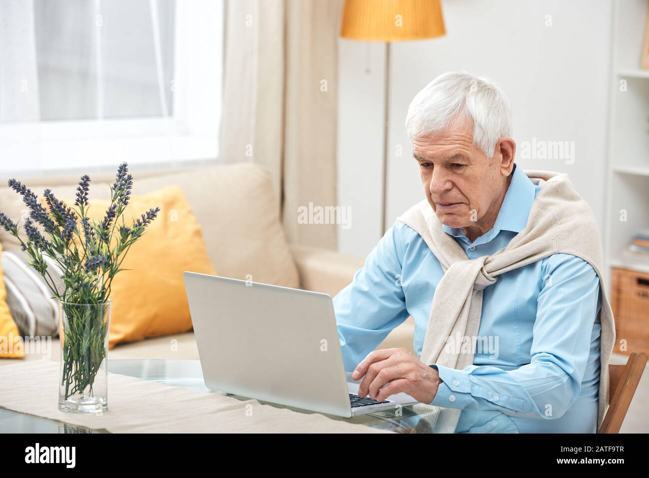 Senior businessman sitting table hi-res stock photography and images ...