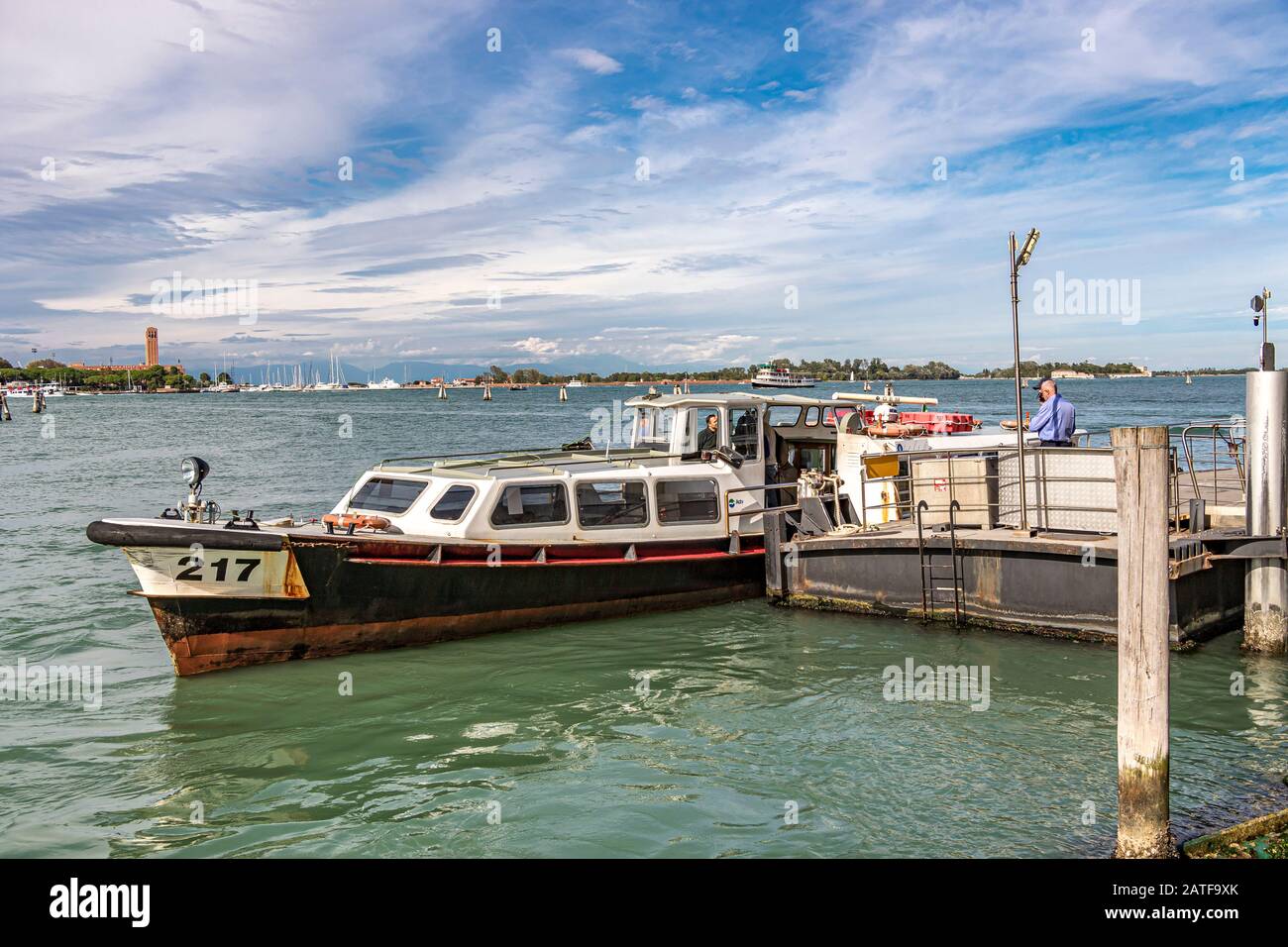 A route 14 vaporetto or water bus at The Lido on The Venice lagoon ...