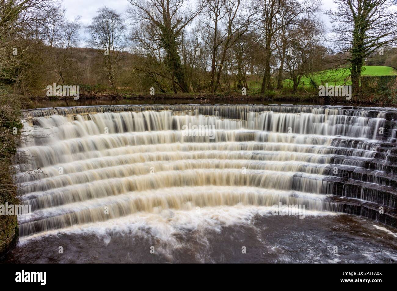Tall multiple level stone weir on the River Etherow. Etherow Country ...