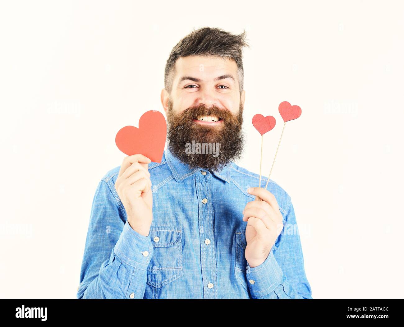 handsome beard man with Valentine Hearts in hands isolated on white ...