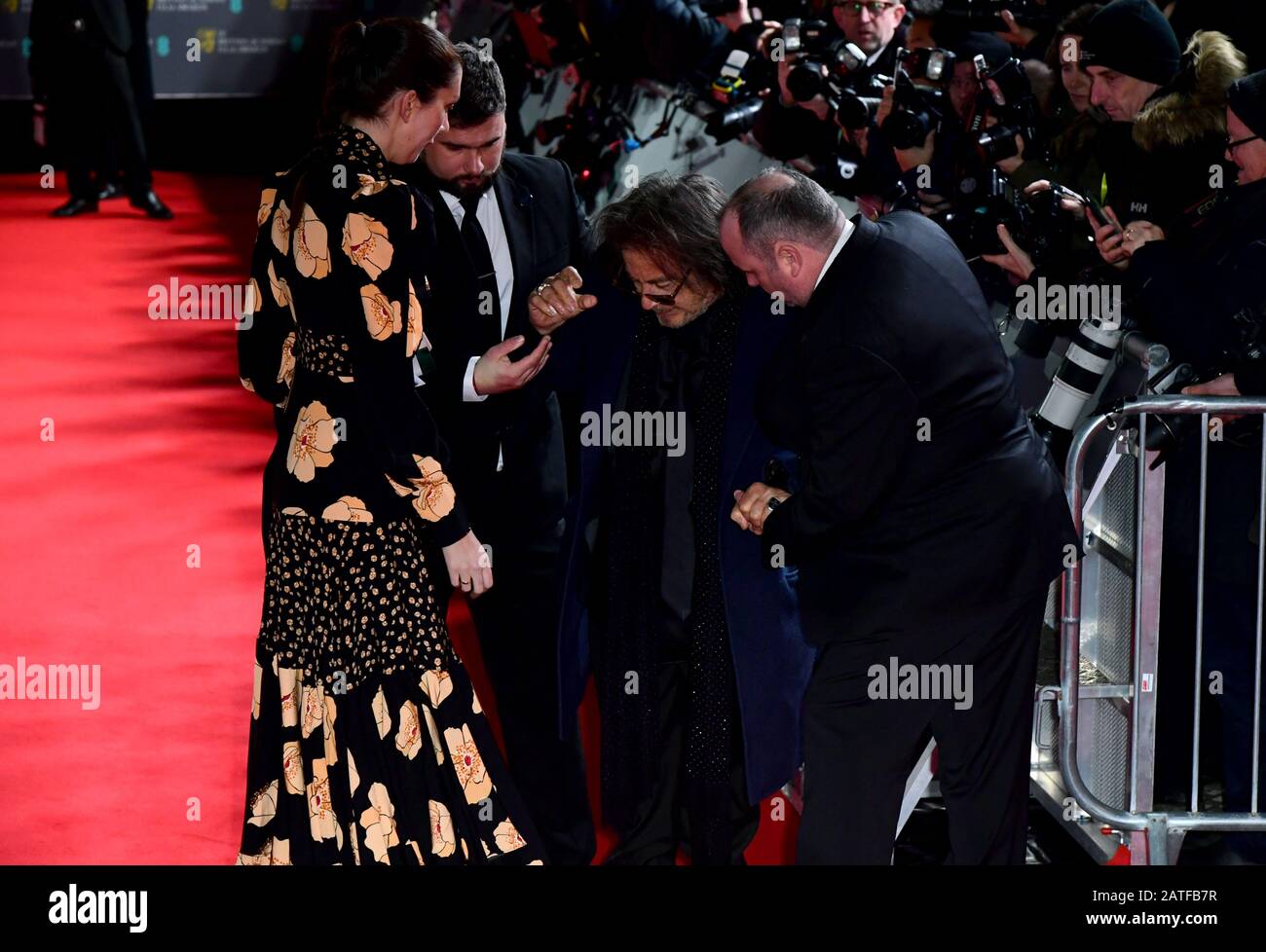 Al Pacino is helped to his feet after falling over whilst attending the ...