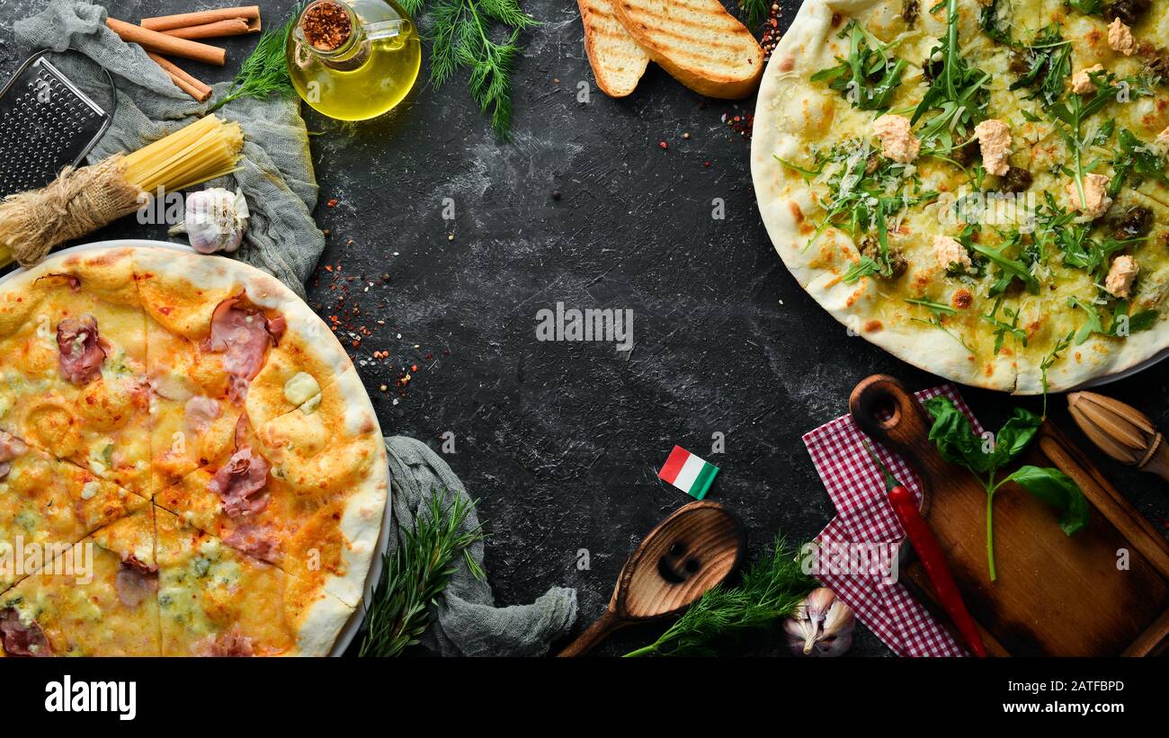 Pizza background. Assortment of pizza and ingredients. Italian ...