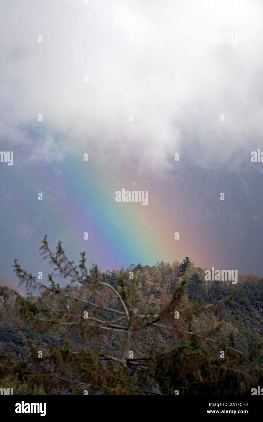 Rainbow in the Alps Stock Photo - Alamy