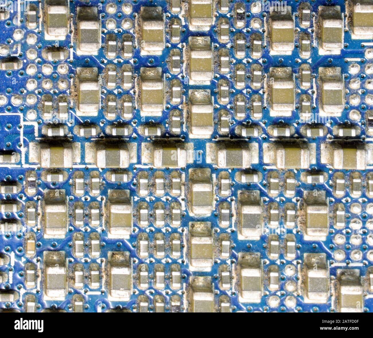 macro photography of an electronic circuit with miniaturized components ...