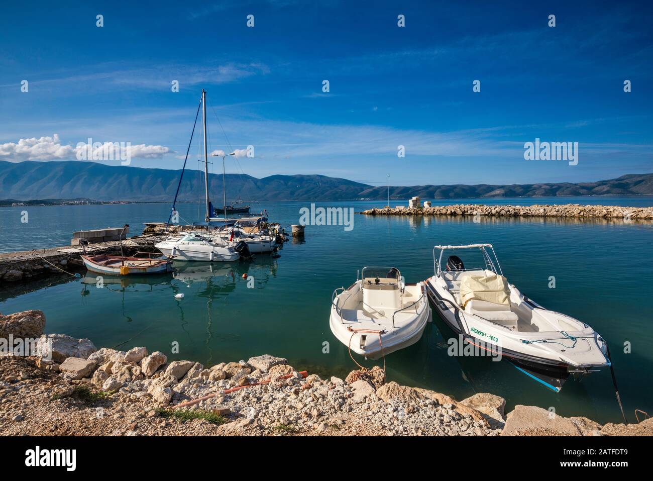 Boats at marina, Bay of Vlora, Adriatic Sea, Karaburun Peninsula massif ...