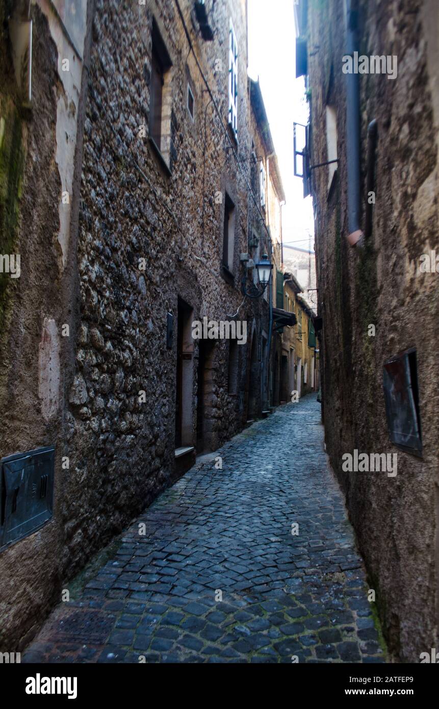 Medieval Italian town, narrow street, cobblestones Stock Photo - Alamy