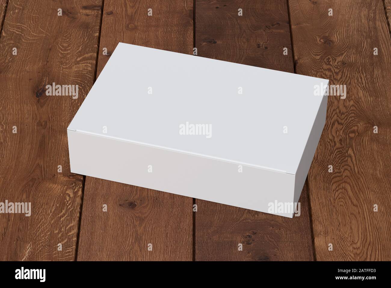 Blank white wide flat box with closed hinged flap lid on dark wooden ...
