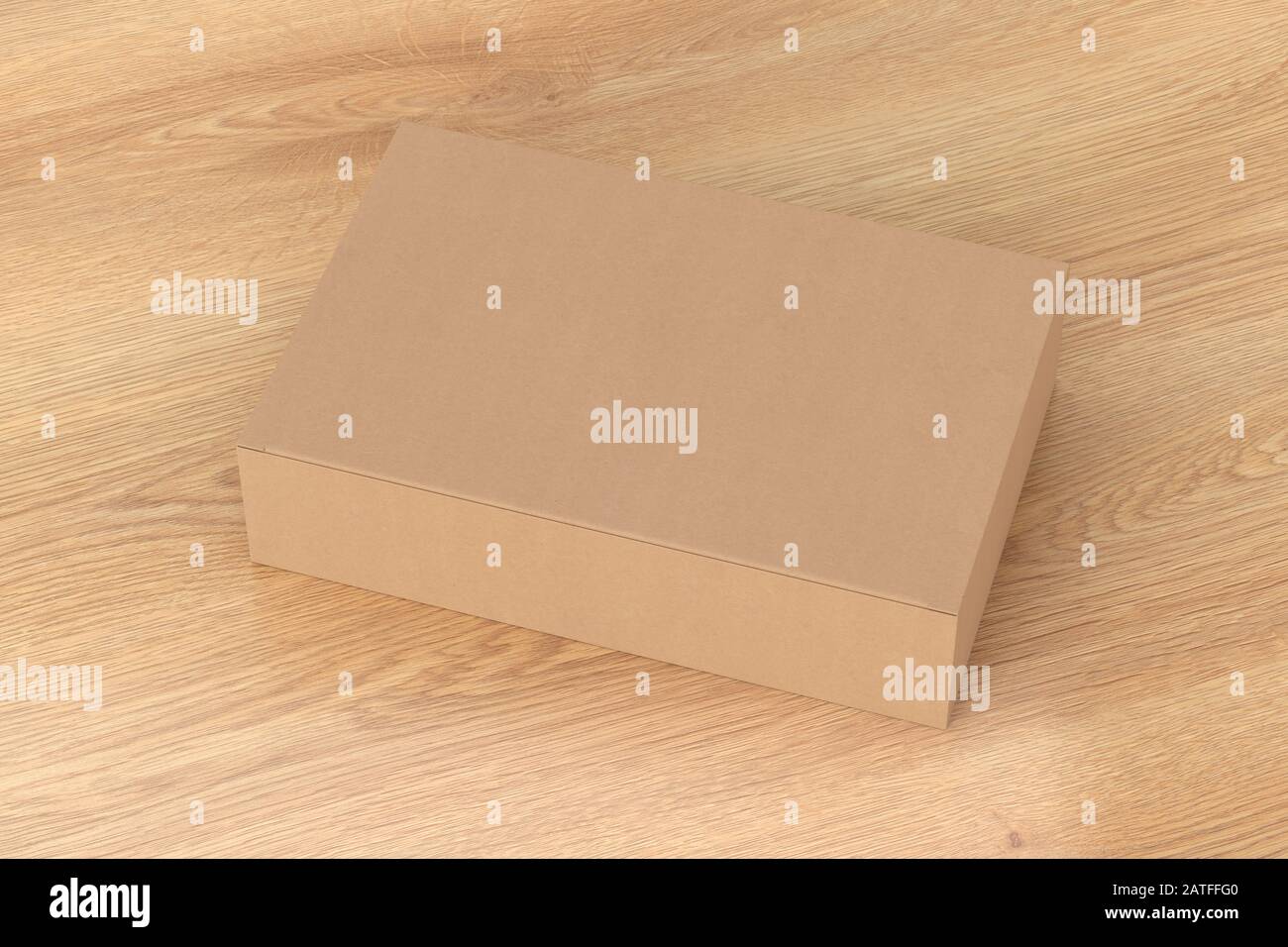Blank cardboard wide flat box with closed hinged flap lid on wooden ...
