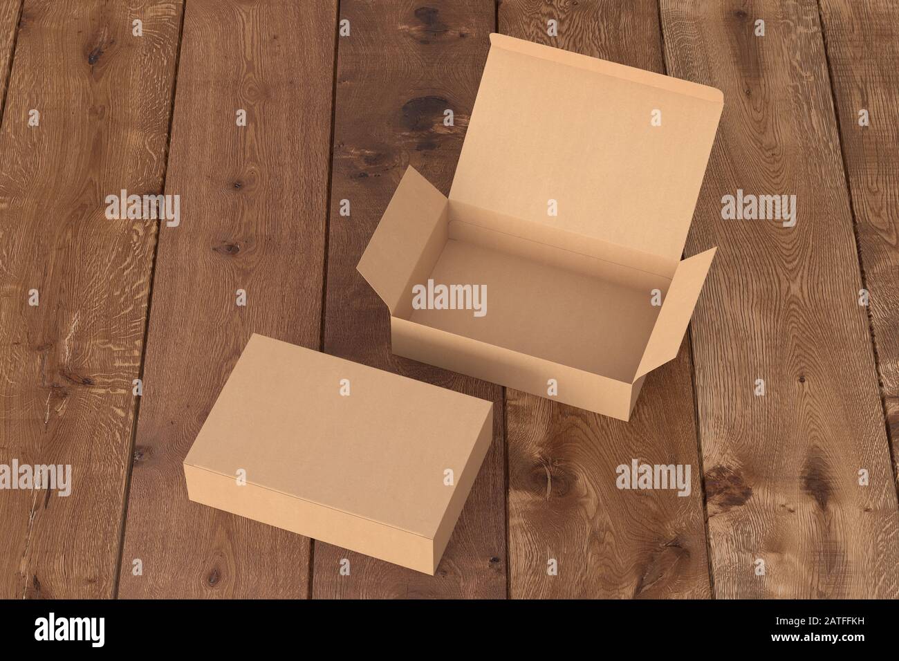 Blank cardboard wide flat box with open and closed hinged flap lid on ...