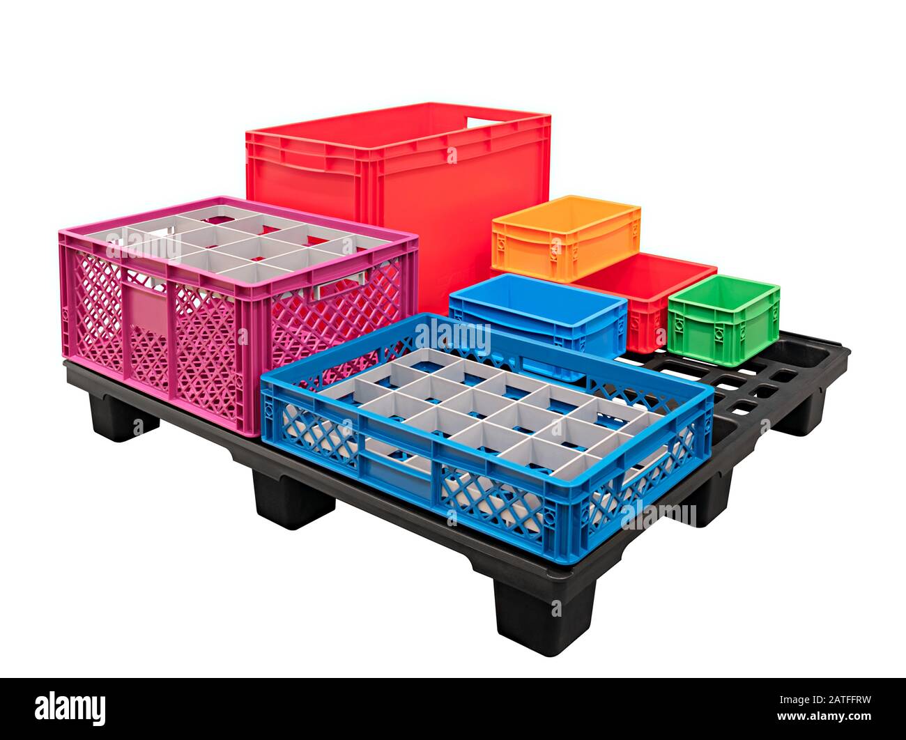 Plastic multi-colored crates and boxes at transport pallet isolated on ...