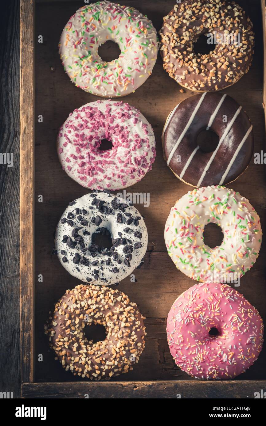 Top down view of fresh donuts with various decoration Stock Photo - Alamy