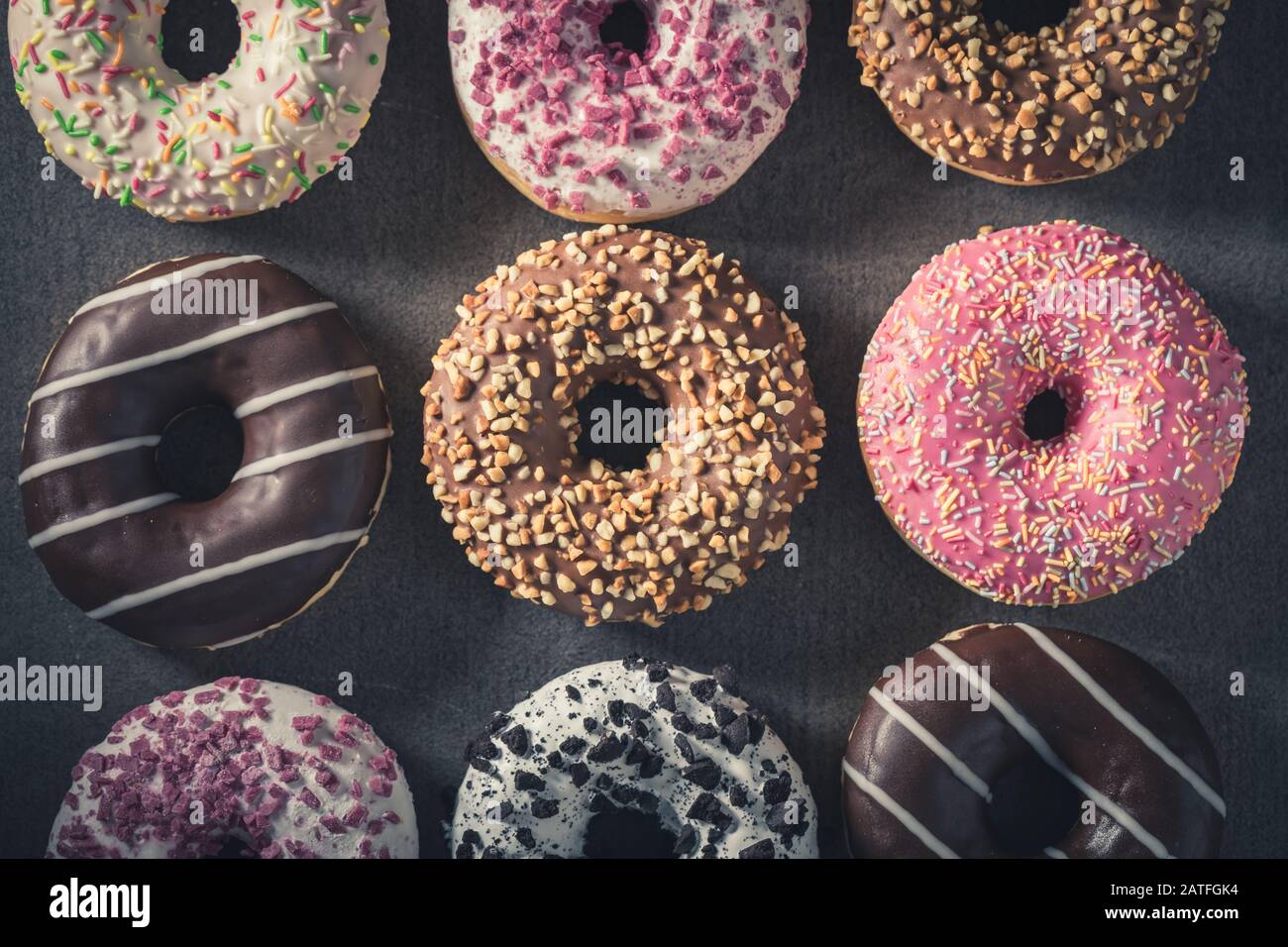Top down view of sweet donuts with sweet glaze Stock Photo - Alamy