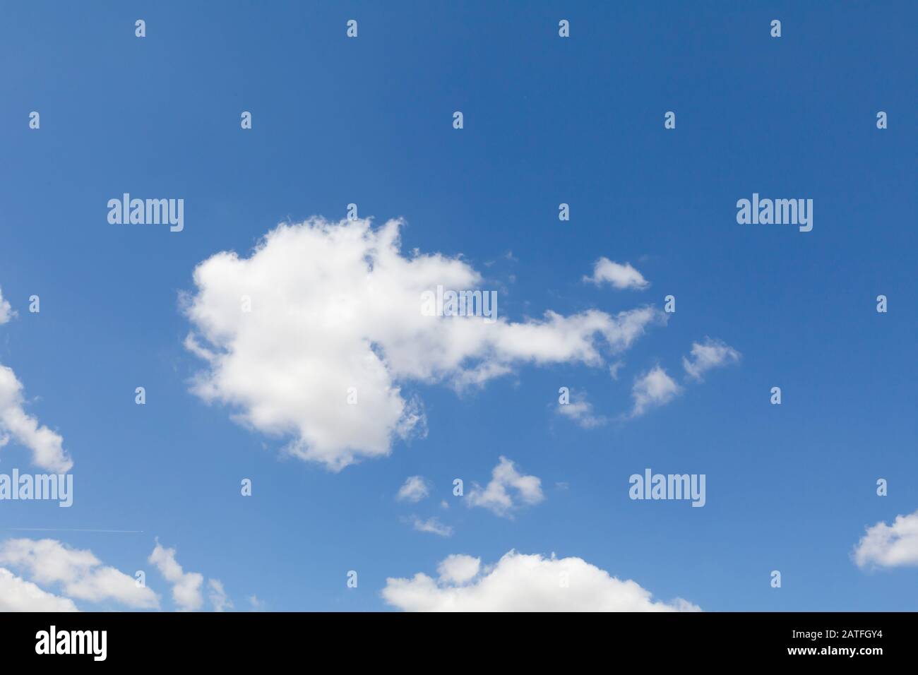Fluffy floating white cloud on a natural blue sky background Stock ...