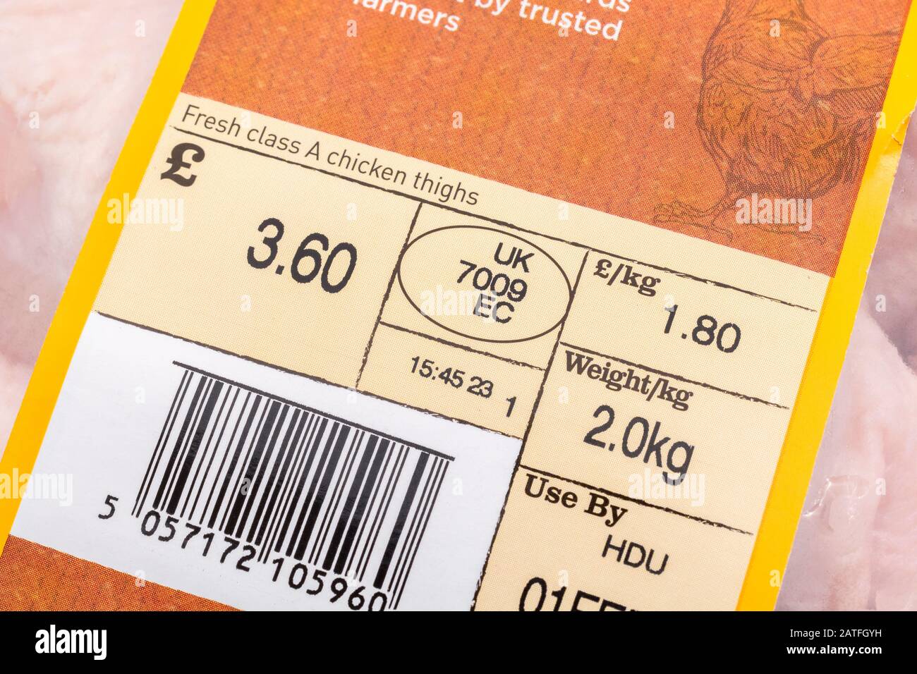 Price by weight food packaging label on ASDA chicken thighs pack (as at ...