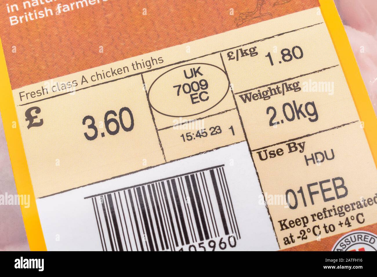 Price by weight food packaging label on ASDA chicken thighs pack (as at ...