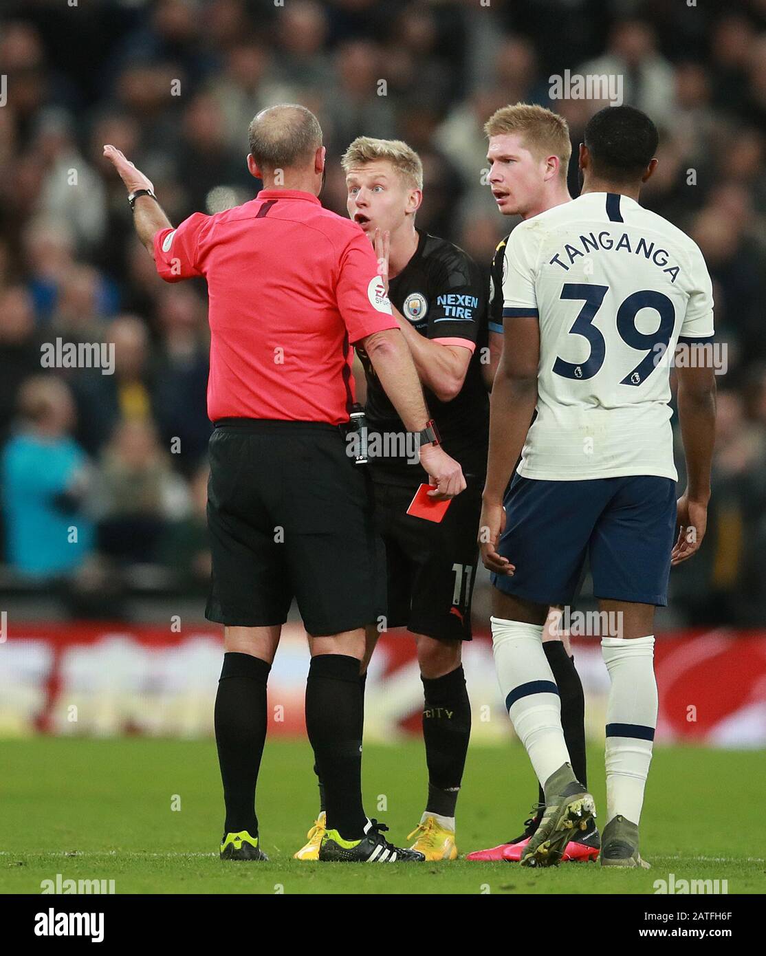 Manchester City's Oleksandr Zinchenko (left) is shown a red during the ...