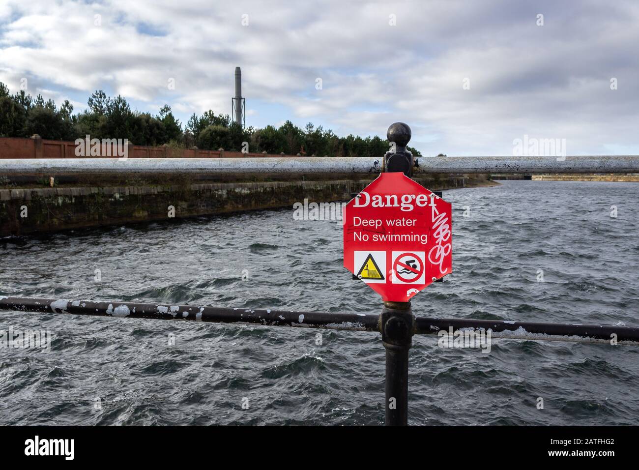Danger deep water no swimming sign at Morpeth dock, Birkenhead Stock ...