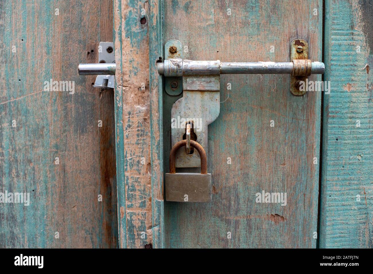 A classic photo of a vintage steel lock protecting the entrance of an ...
