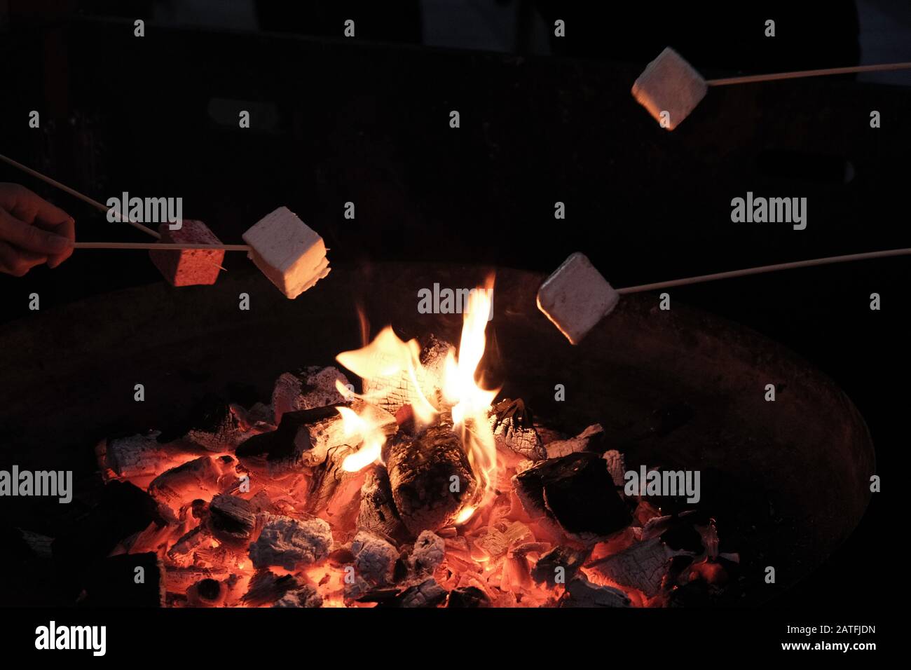 Marshmallow roasted over fire, London, United Kingdom Stock Photo - Alamy