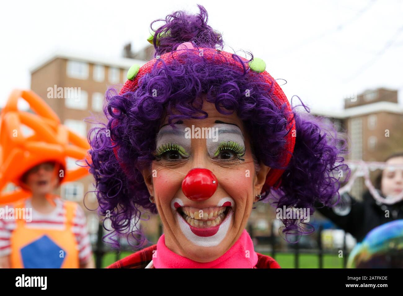 A clown dressed in full costume arrives for the annual Grimaldi Clown ...