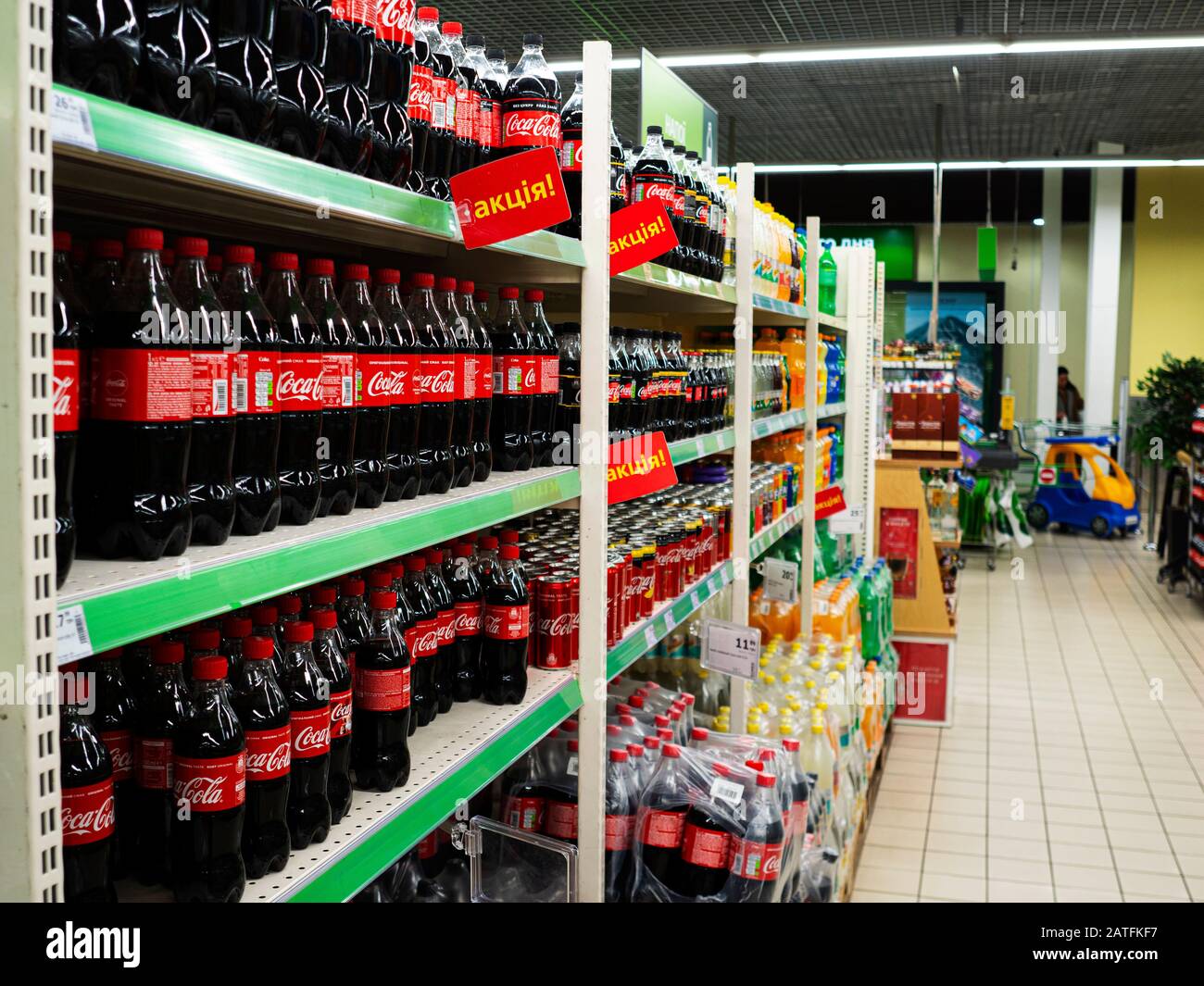 Coca-Cola bottles are seen in the store shelf Stock Photo - Alamy