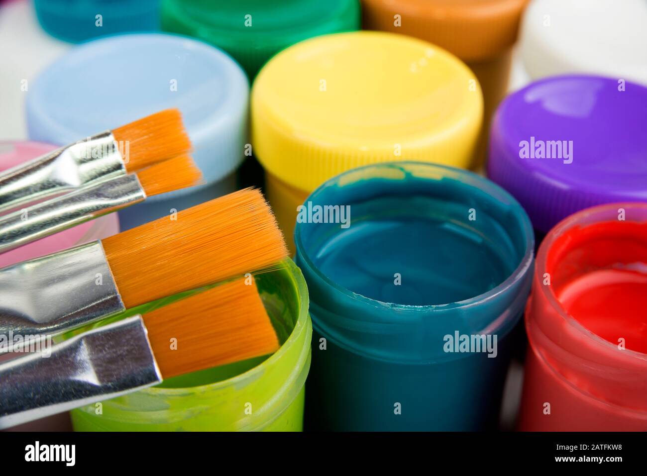 Details of colorful school paints and brushes Stock Photo - Alamy
